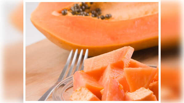 Why papaya turns toxic when combined with this food?