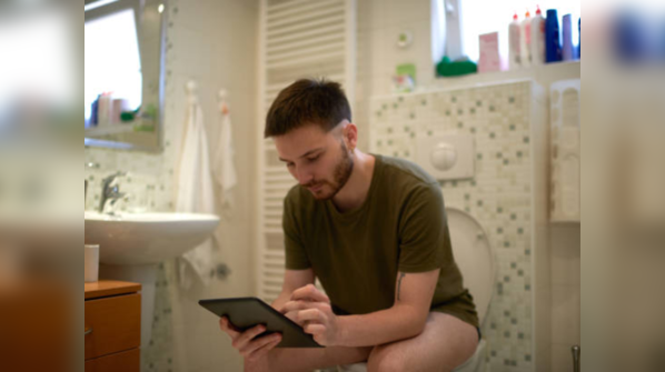 Using mobile phone in the toilet can lead to this painful condition