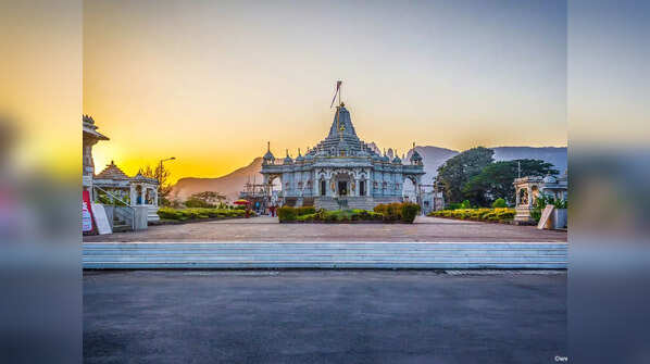 What does a flag at the top of a temple signify