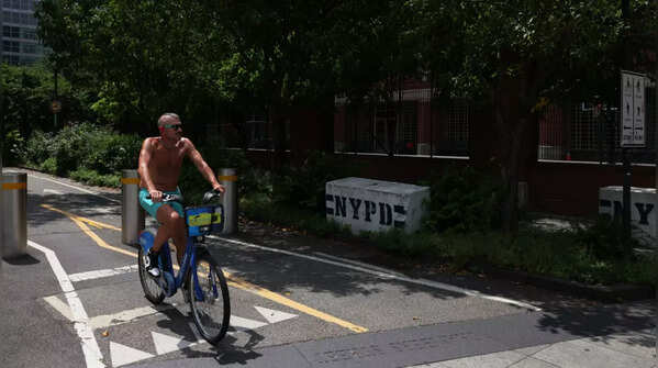 In pics: US heat wave soars as California wildfire rages