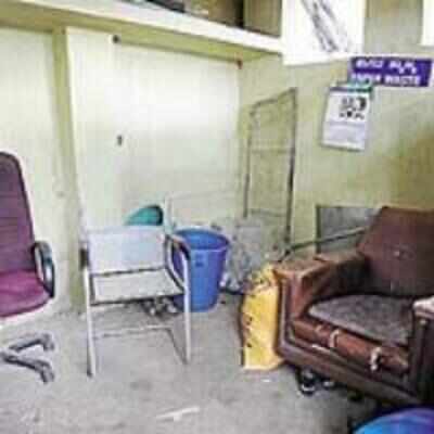 BDA workers use storage space for dry waste as resting room
