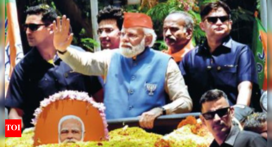 Sea of saffron greets PM Narendra Modi at BJP’s show of strength in ...