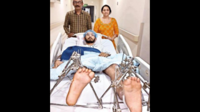 Man loses both legs in car crash, on road to recovery after rare surgery in Ahmedabad ...
