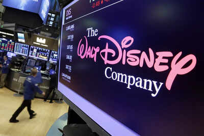Wall Street edges lower following inflation data, drops for Disney ...