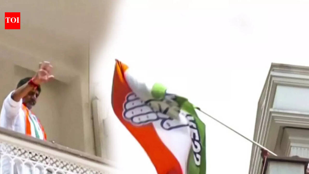 DK Shivakumar waves party flag, shows thumbs up as Congress crosses ...