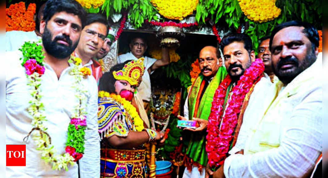 Revanth chants 'Bajrang Bali' on victory lap, says saffron exposed ...