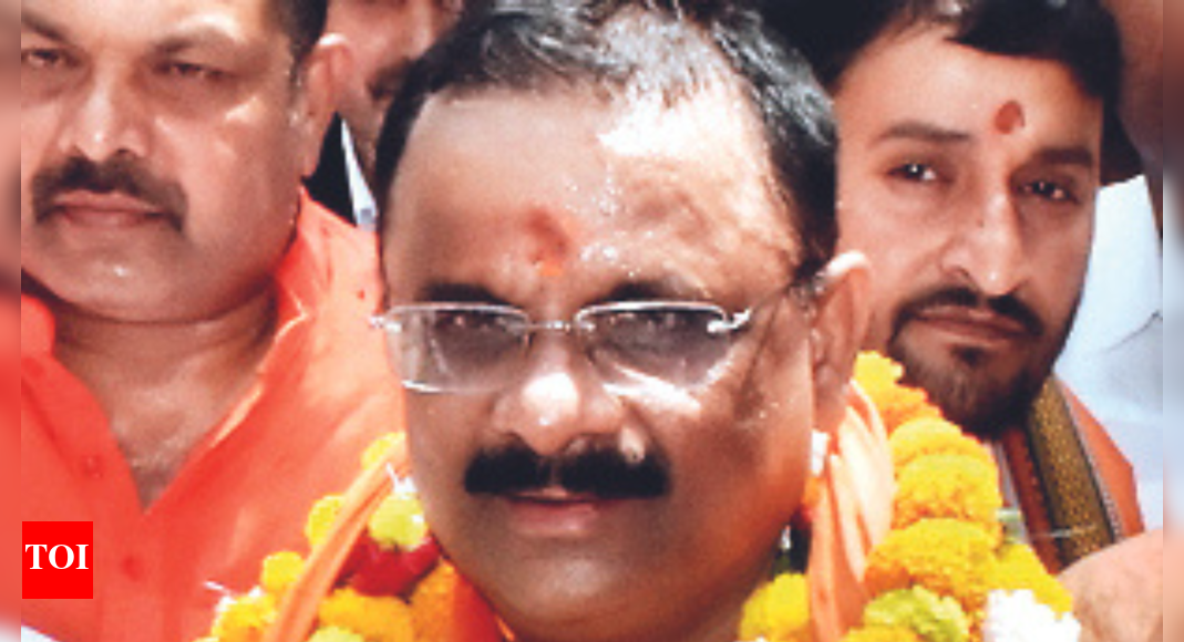 BJP's Ashok Tiwari steals a march over SP's OP Singh | Varanasi News - Times of India