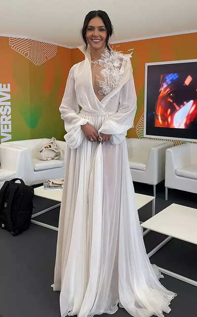 Esha Gupta looks gorgeous in a white thigh-high slit gown on Cannes ...