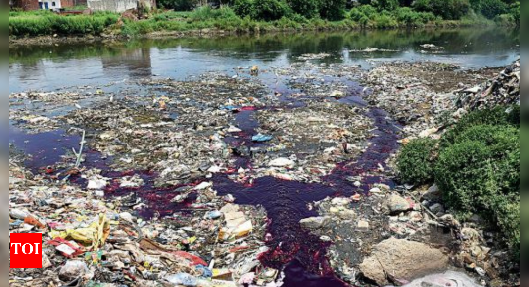 A river turns red: Pollution bleeds Hindon | Noida News - Times of India