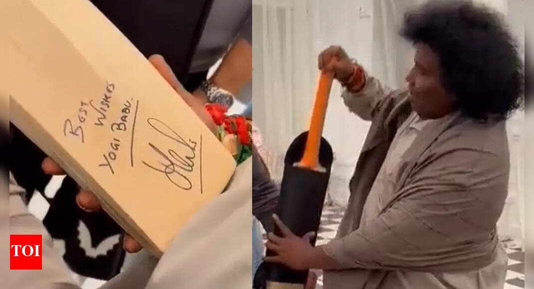 MS Dhoni gifts a signed cricket bat to Yogi Babu | Tamil Movie News ...