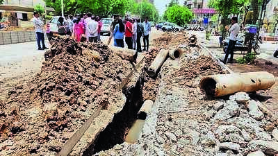 Amc: Amc Digs Up 30m Of White Topping Road In Gurukul | Ahmedabad News ...