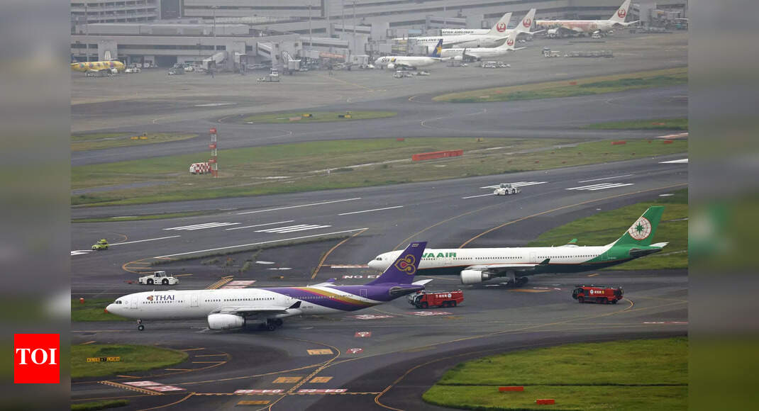 Tokyo: Runway reopens at Tokyo's Haneda airport after 2 planes bump ...