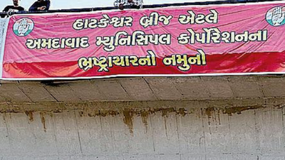 Corruption posters on Hatkeshwar flyover | Ahmedabad News - Times of India