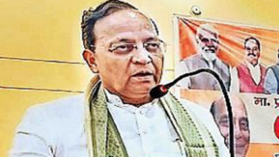 Bjp: BJP MP visits 5 families with book on 9 years of Modi govt - Times ...