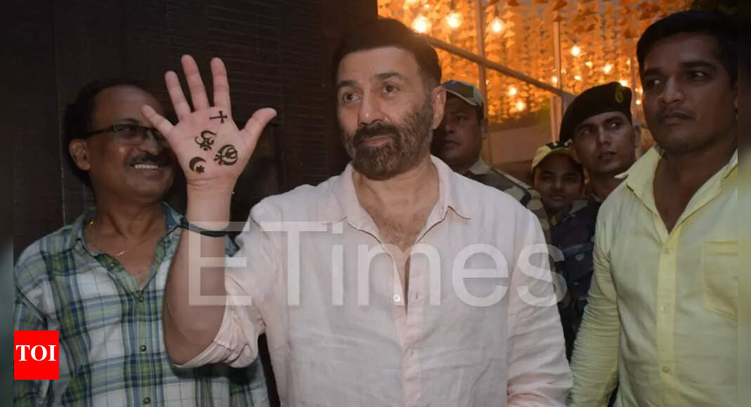 Sunny Deol Shows His Mehendi Design With Religious Symbols At Son Karan Deols Pre Wedding