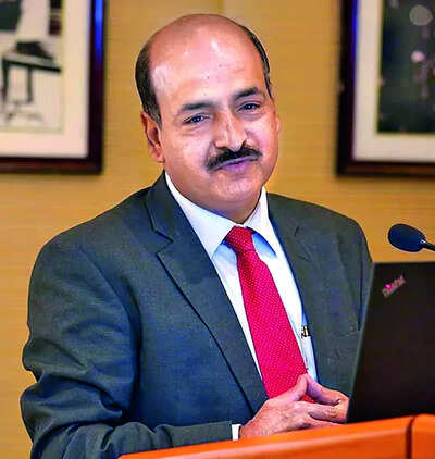 Axis: Ex-rbi Dy Guv Named Axis Chairman | - Times of India