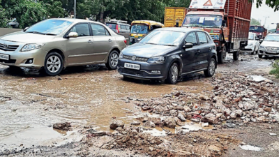 Craters & sewage overflow: Why ride is a nightmare on this road ...