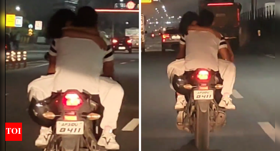 Lovers seen 'cuddling' on moving motorcycle: Rs 21,000 challan issued ...