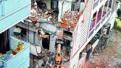 Leaning Chintal bldg razed, adjacent structure 'stable' | Hyderabad ...
