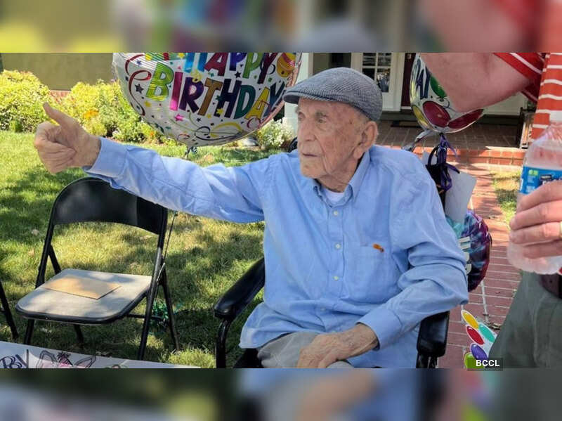 Man celebrates 100th birthday with 200 dogs - Times of India