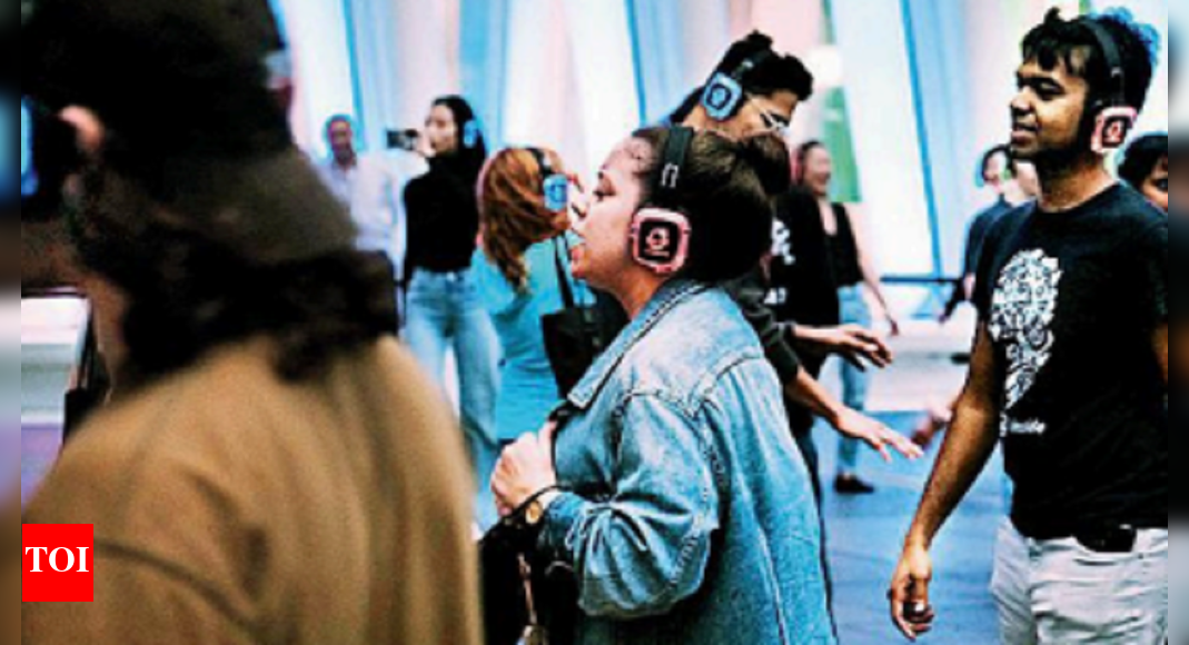 Clubs go quiet as music plays on headphones | Pune News - Times of India
