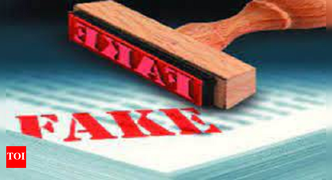 Doc accused of making fake Covid reports | Bengaluru News - Times of India