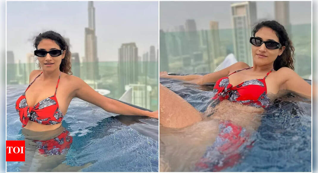 Arshiya Arshi raises the temperature as she poses in an orange bikini | Bhojpuri Movie News ...