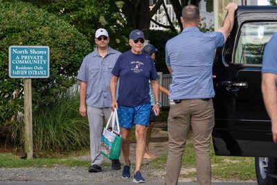 Joe Biden: Joe Biden hits the beach - and ditches the shirt - Times of ...