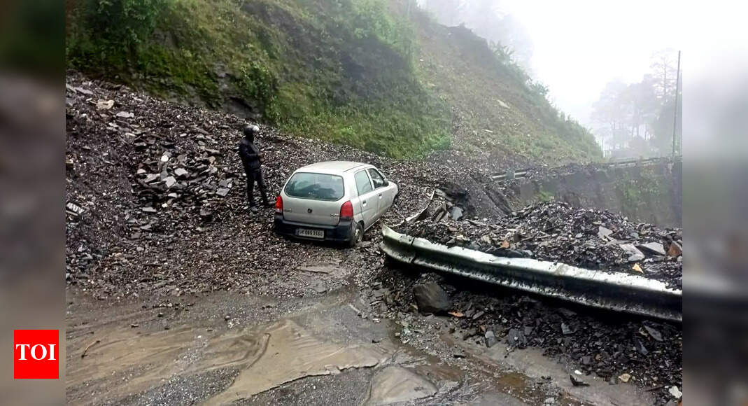 Car Buried: Car buried under landslide debris, 5 found dead | India News - Times of India