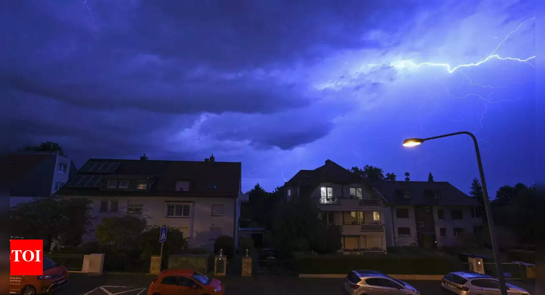 German storm causes flight cancellations, floods - Times of India