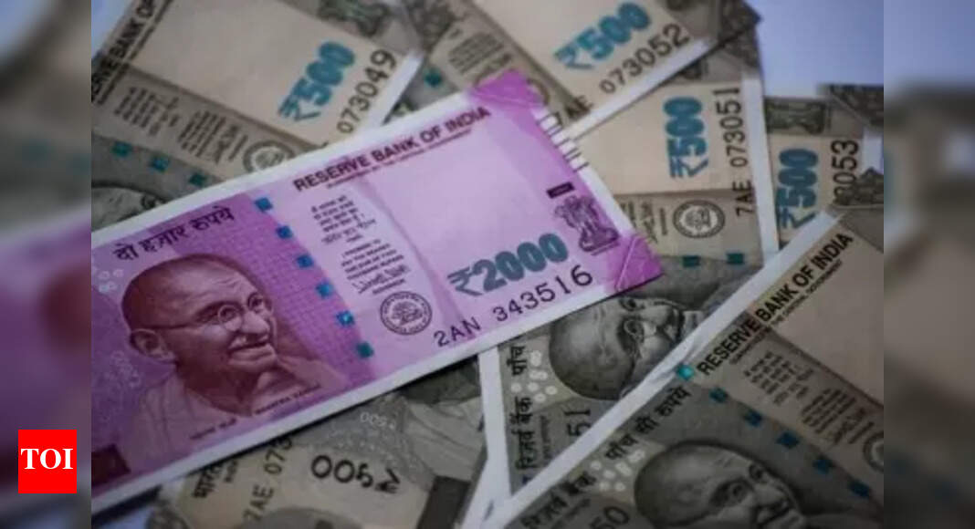 Rupee surges 25 paise to 82.47 against US dollar - Times of India