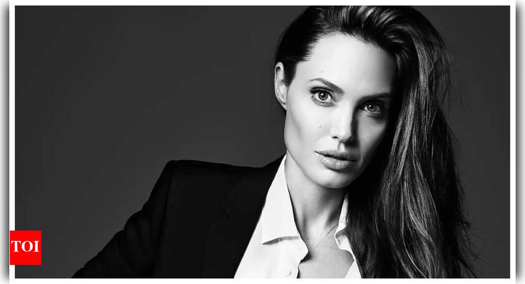 Are Angelina Jolie's middle finger tattoos really about Brad Pitt ...