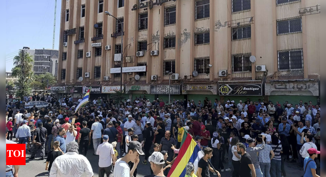 Syria's Assad's ruling party shut by protests in rebellious Druze city ...