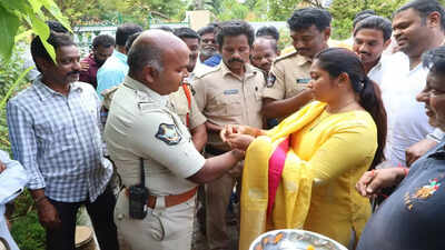 Wife of TDP leader ties rakhi to police officers who came to place her ...