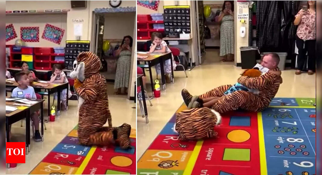 Heartwarming! US soldier dressed as mascot surprises son after being ...