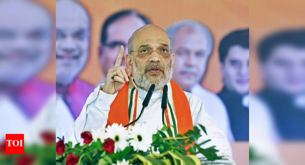 Shah woos tribals in MP, slams Congress’ ‘minority appeasement’ | India ...