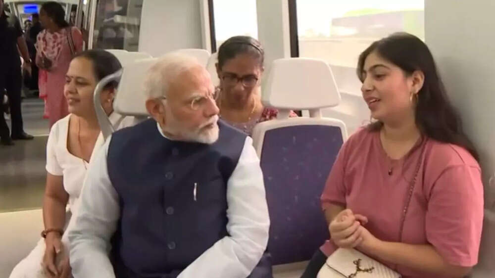 Selfies and smiles: PM Modi travels in Delhi Metro on his birthday ...