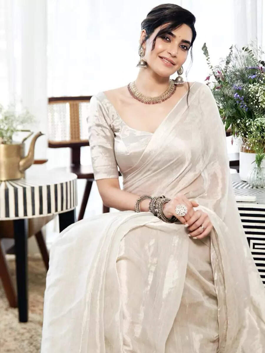 Karishma Tanna defines elegance and grace in an ivory white silk saree ...