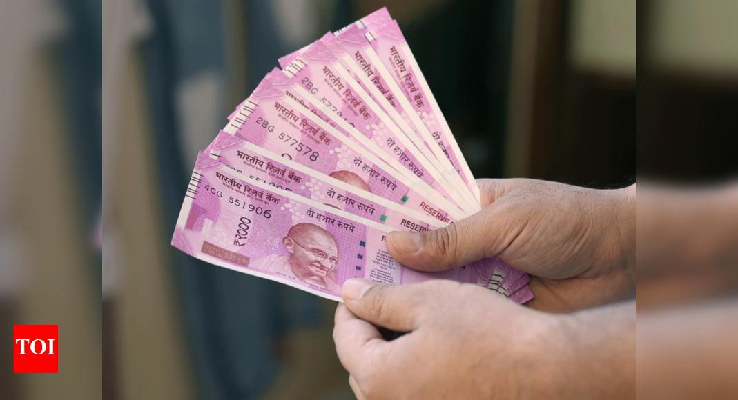 Rupee falls 16 paise to 83.10 against US dollar in early trade - Times ...