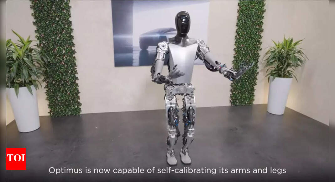 Watch: Tesla's humanoid robot shows Yoga moves, greets 'Namaste ...