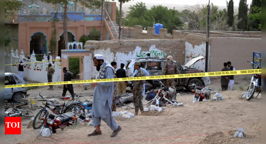 60 killed in twin suicide blasts in Pakistan as people gather at ...