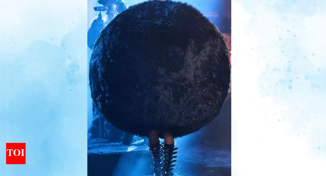 Paris Fashion Week 2023: Model in huge furball costume loses balance ...