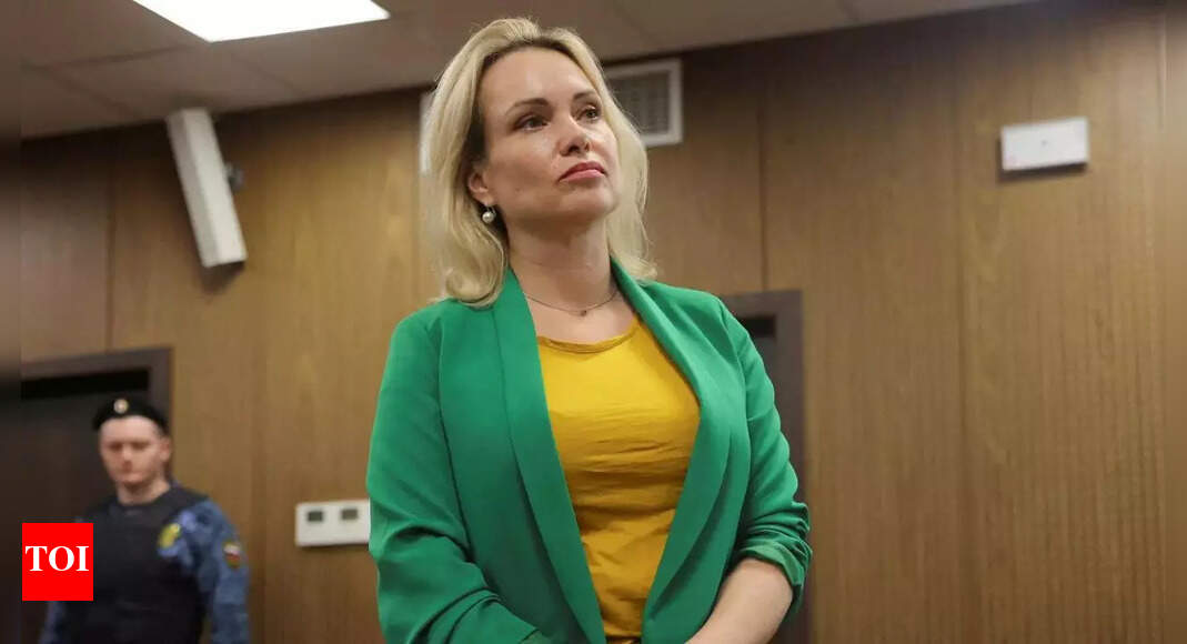 Russian reporter who protested on TV jailed in absentia - Times of India