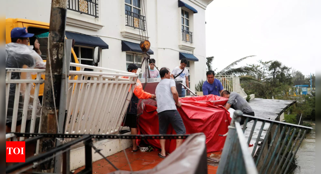 Typhoon Koinu turns south off China's coast, headed for Hainan - Times ...