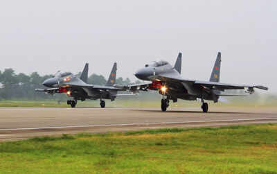 China sends fighter jets to warn US warplane flying over Taiwan Strait ...