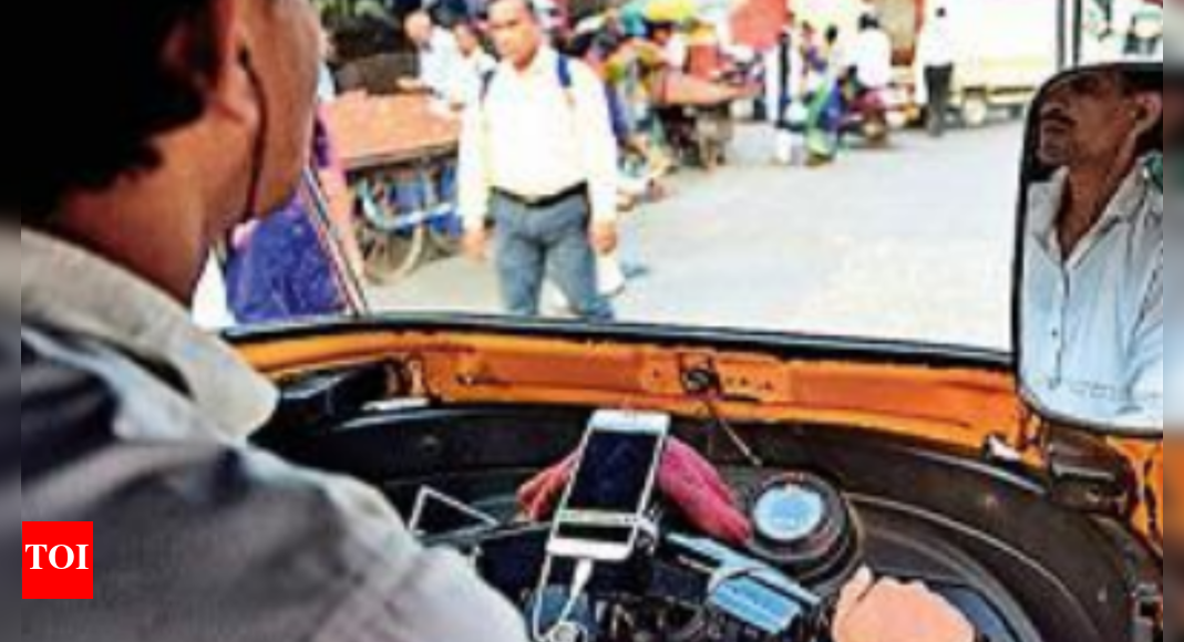 Risky business: Mumbai auto drivers take to viewing videos on job ...