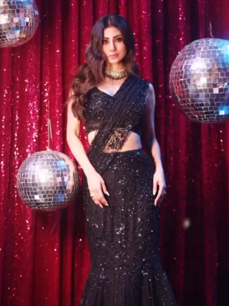 Mouni Roy shines bright in a black shimmery fishtail saree | Times of India