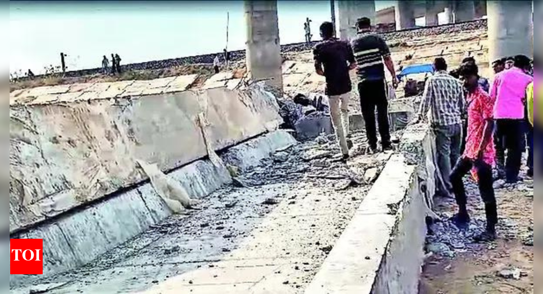 7 booked in rail overbridge collapse | India News - Times of India