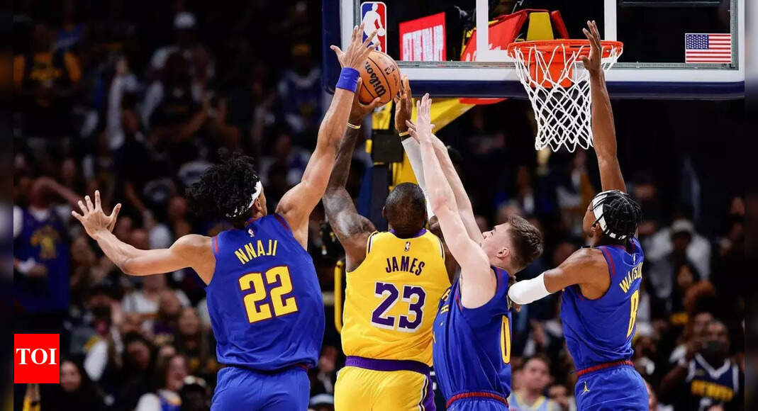 NBA: Defending champs Denver Nuggets win season opener 119-107 against ...