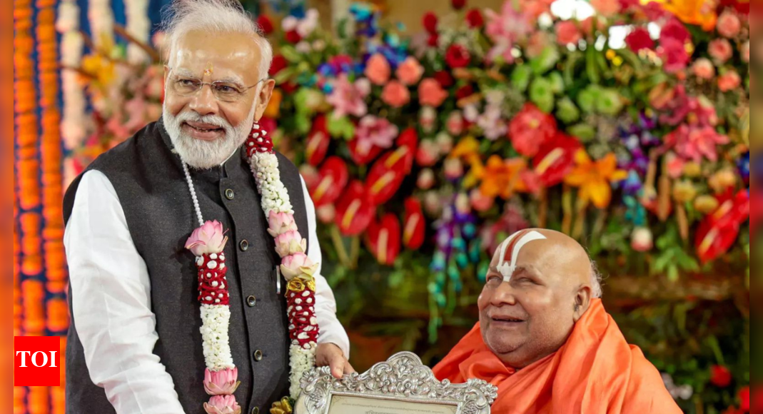 PM Modi hails Madhya Pradesh spiritual guru's role in Ram temple cause ...